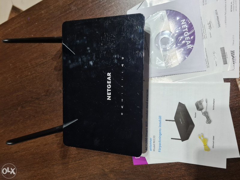 RUTER NETGEAR AC1200 *R6220-100PES* - Router - OLX.ba