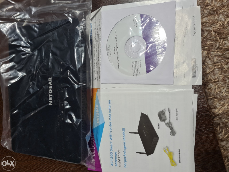 RUTER NETGEAR AC1200 *R6220-100PES* - Router - OLX.ba
